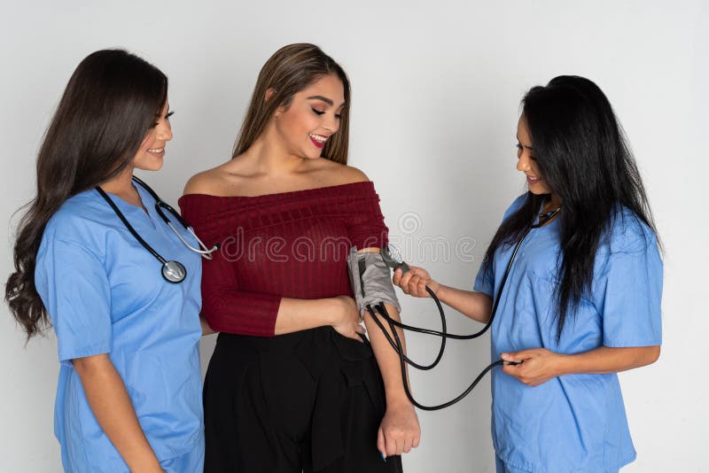 Medical Team with Patient stock image. Image of female - 169450649