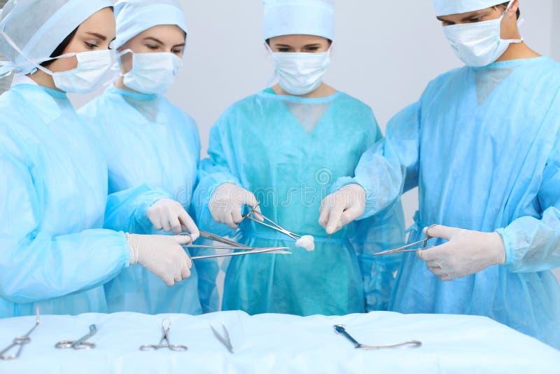 Medical Team Performing Operation. Focus at Male Doctor Stock Photo ...