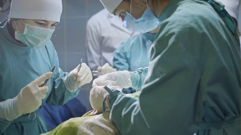 Medical Team Performing Operation. Group of Surgeon at Work Stock Image ...