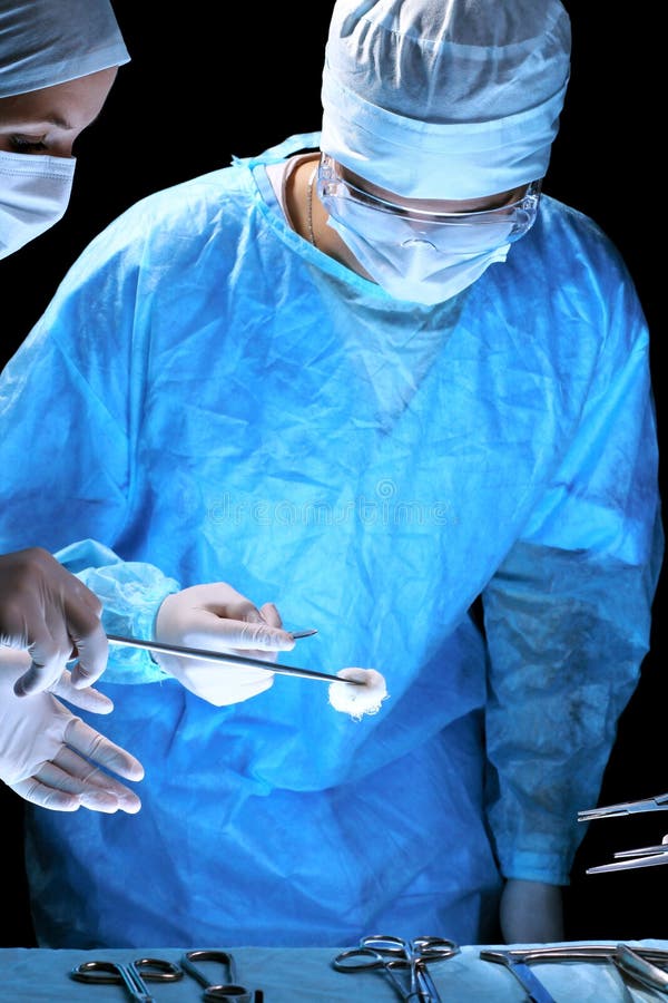 Medical Team Performing Operation. Group of Surgeon at Work in ...