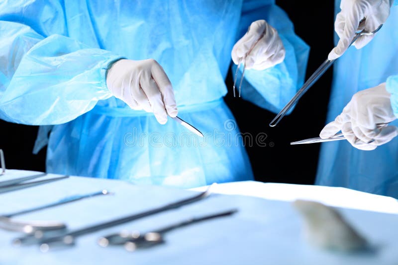 Medical Team Performing Operation. Group of Surgeon is Working in ...