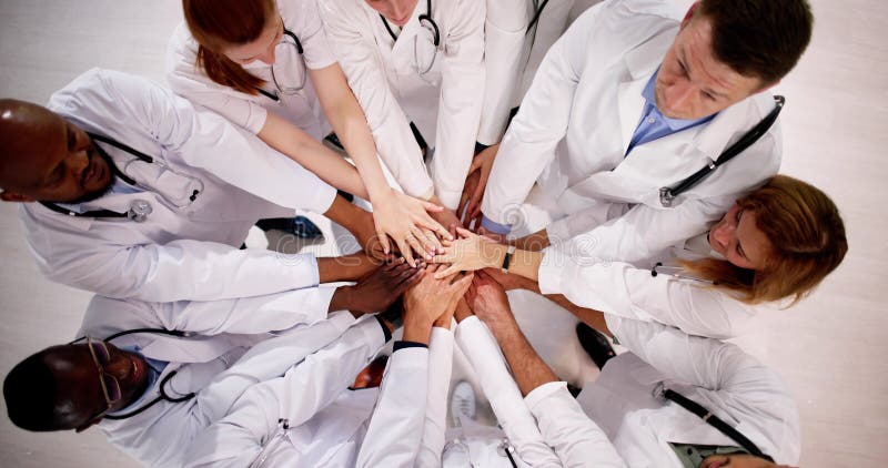 Medical Team Stacking Hands Against Stock Photo - Image of african ...