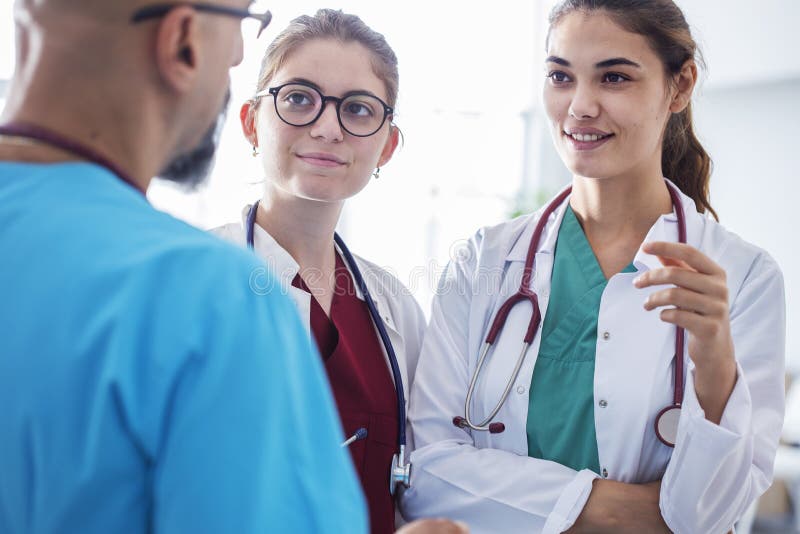 Medical Team Standing on Talking Stock Photo - Image of coat, physician ...