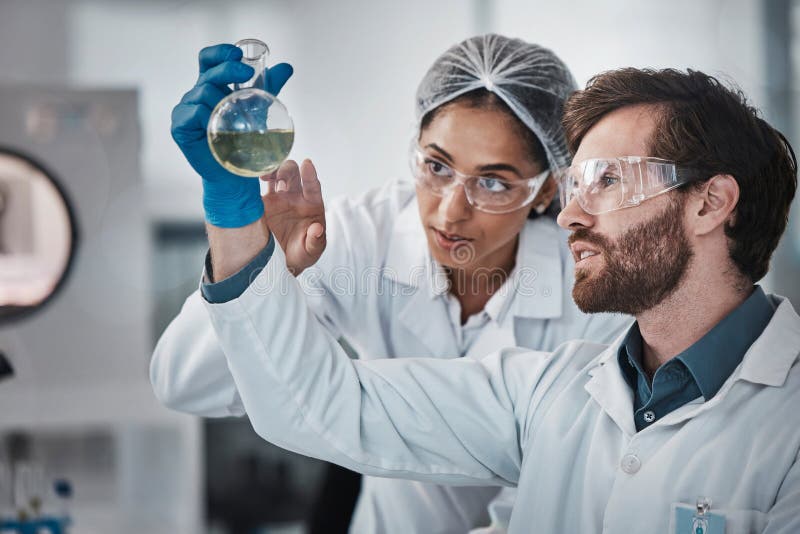 Medical, Team Work or Scientists in Laboratory with Chemical Liquid ...