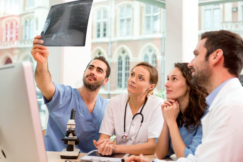 Medical Team Working at the Hospital All Together Stock Photo - Image ...
