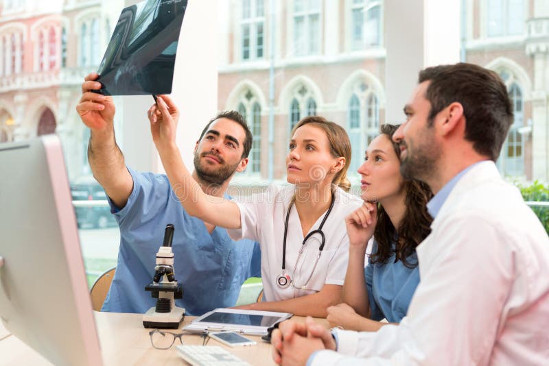 Medical Team Working at the Hospital All Together Stock Photo - Image ...