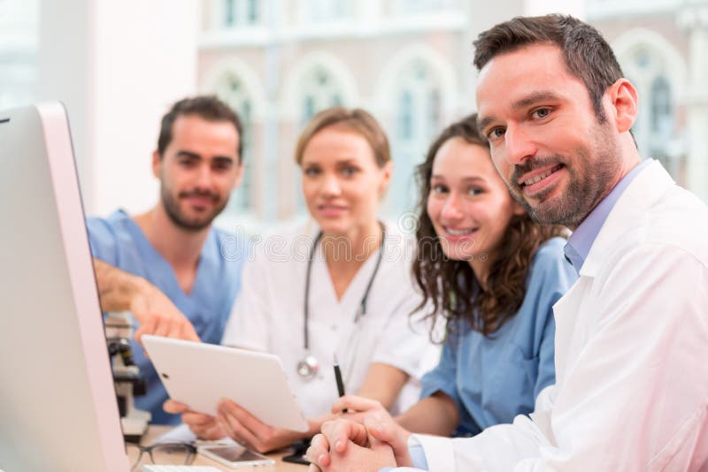 Medical Team Working at the Hospital All Together Stock Photo - Image ...