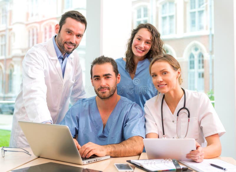 Medical Team Working at the Hospital All Together Stock Photo - Image ...