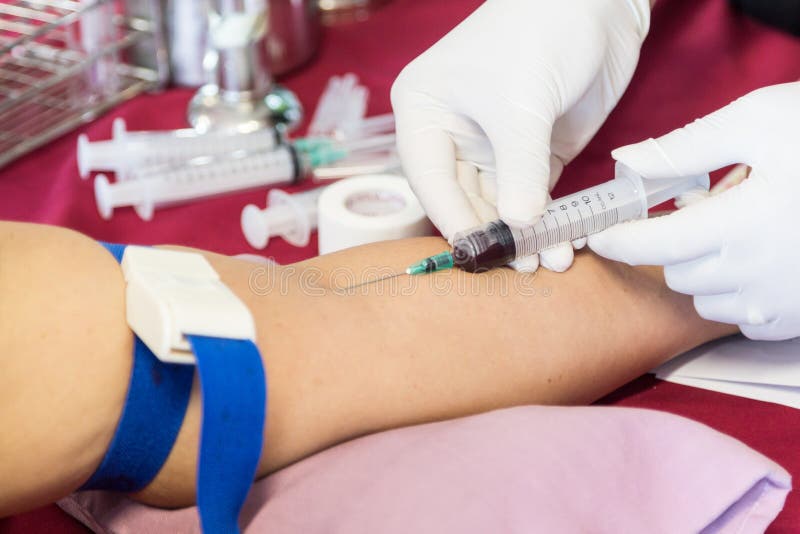 Medical Technologist Drawing Blood Sample for Laboratory Test Stock ...