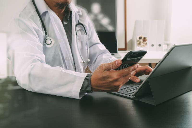 Medical Technology Concept. Doctor Working with Smart Phone and Stock ...