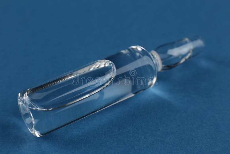 Vaccine Vial on Blue Background Stock Image - Image of infection ...