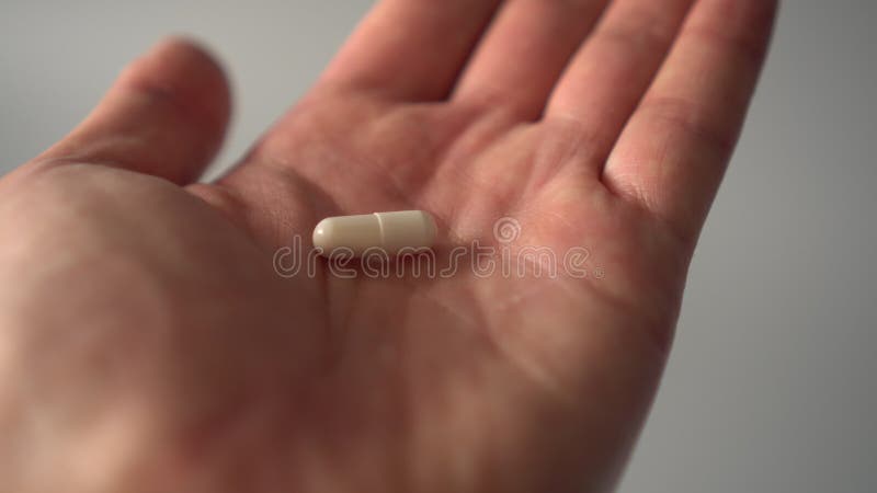 Medical White Capsule Drops in a Palm Stock Footage - Video of health ...