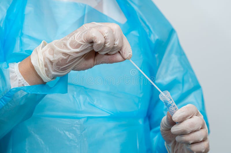 A Medical Worker Holding a Swab Sample Collection Kit Stock Image ...