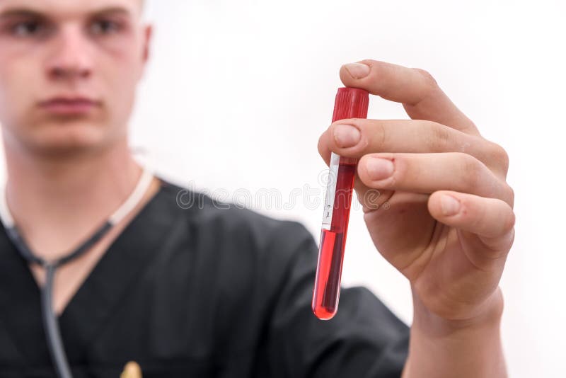 Medical Worker in Laboratory Looking on Red Blood in Test Tube ...