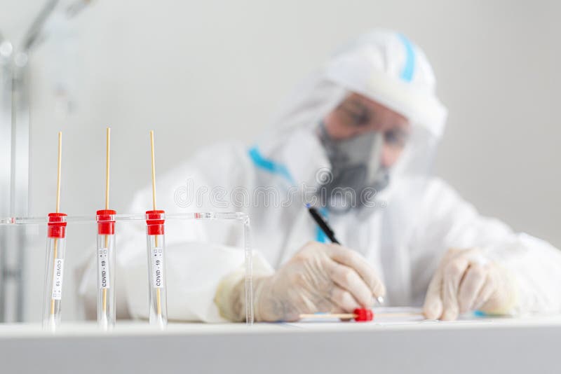 Medical Worker in PPE Working with COVID-19 Test in Hospital Lab Stock ...