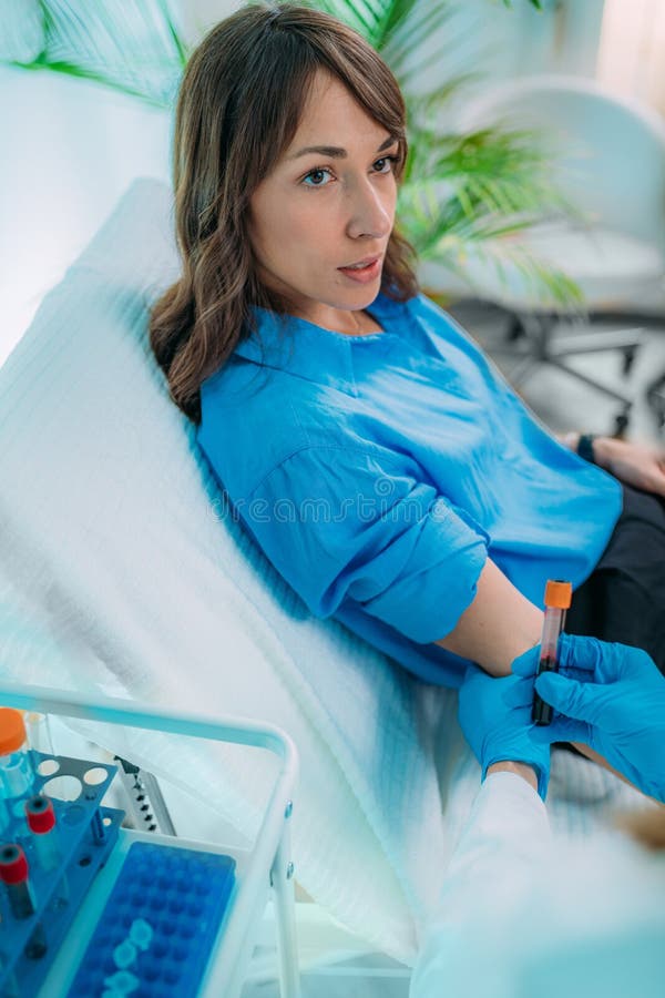 Medical Worker Taking Blood Sample from Patient in the Hospital Stock ...