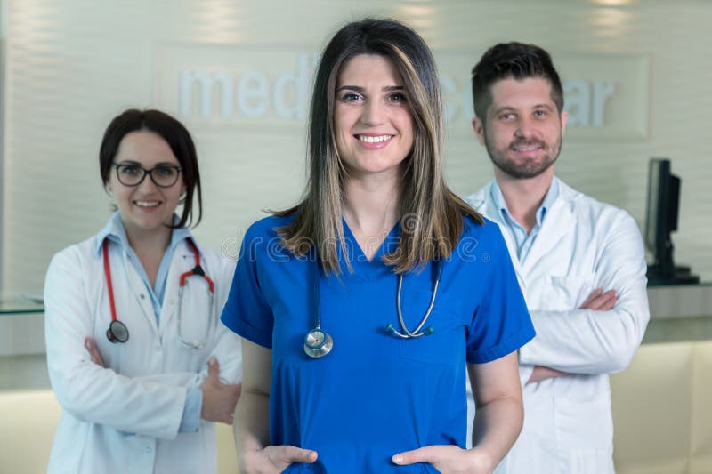 Medical workers in clinic stock photo. Image of cute - 74834254