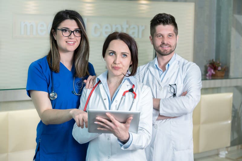 Medical workers in clinic stock image. Image of background - 74834213