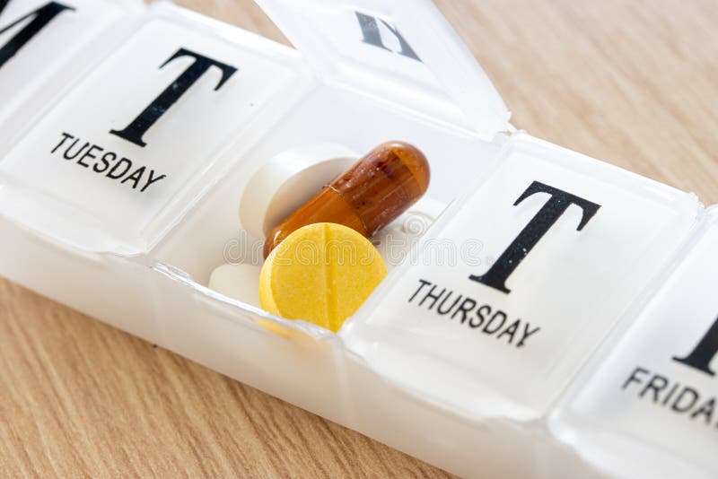 A Medicaments in a Plastic Box with Descriptions of Each Day of Use ...