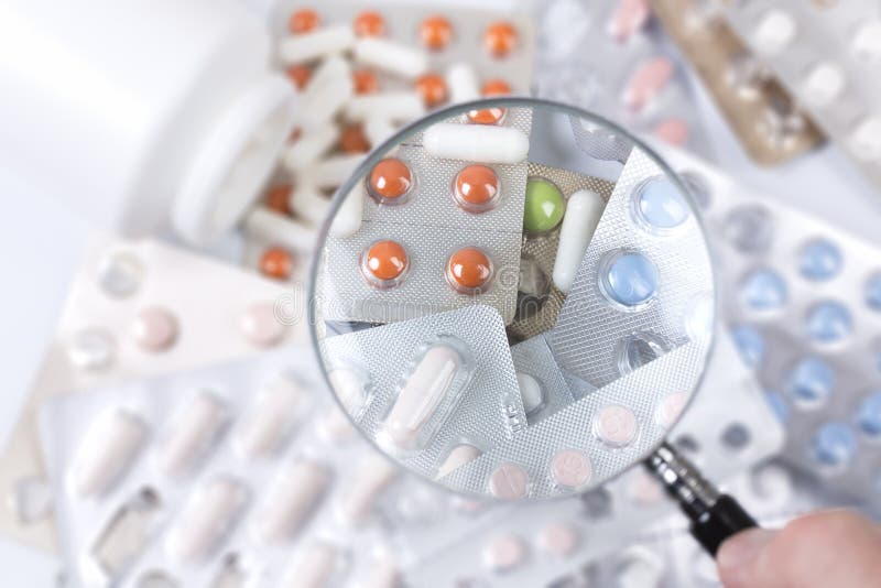 Medicaments Under Magnifying Glass Stock Image - Image of magnification ...
