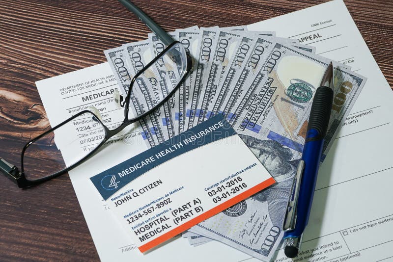 Medicare Card, Application Form and Cash with Eyeglasses and Pen. Stock ...