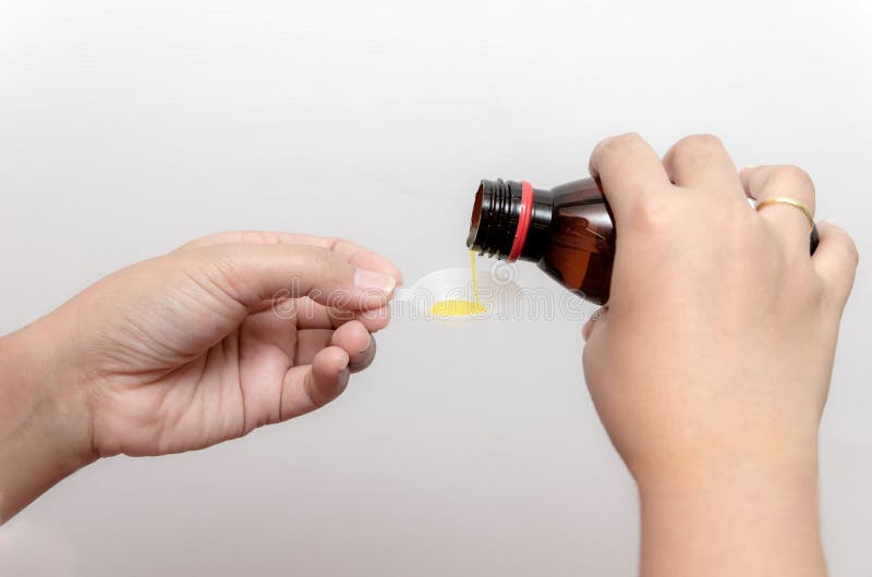 Medicated Syrup Hand Pouring Syrup Stock Photos - Free & Royalty-Free ...