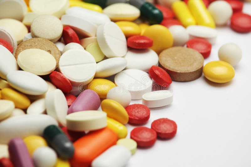 Different Colorful Tablets at White Background Stock Photo - Image of ...