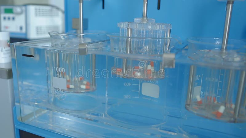 Dissolution Apparatus Testing Medication Pills Stock Footage - Video of ...