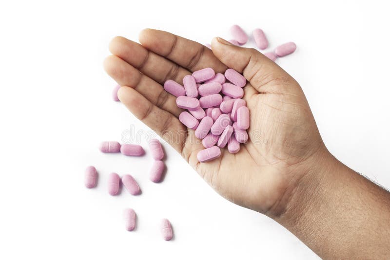 Pills or Caplet on Human Hand Stock Image - Image of homeopathy ...