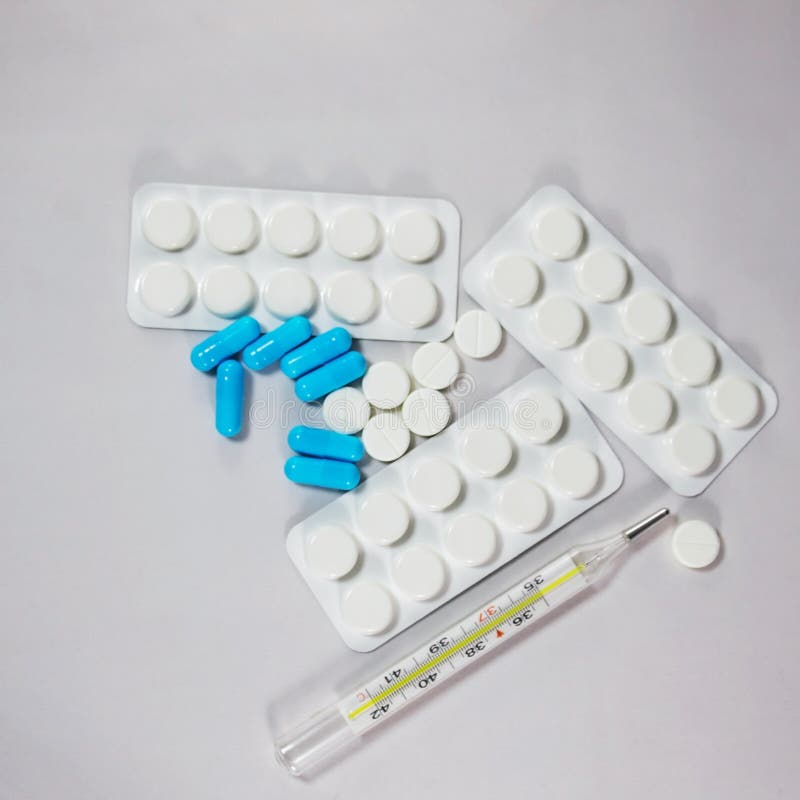 Medication and Thermometer for Measuring Body Temperature Stock Image ...