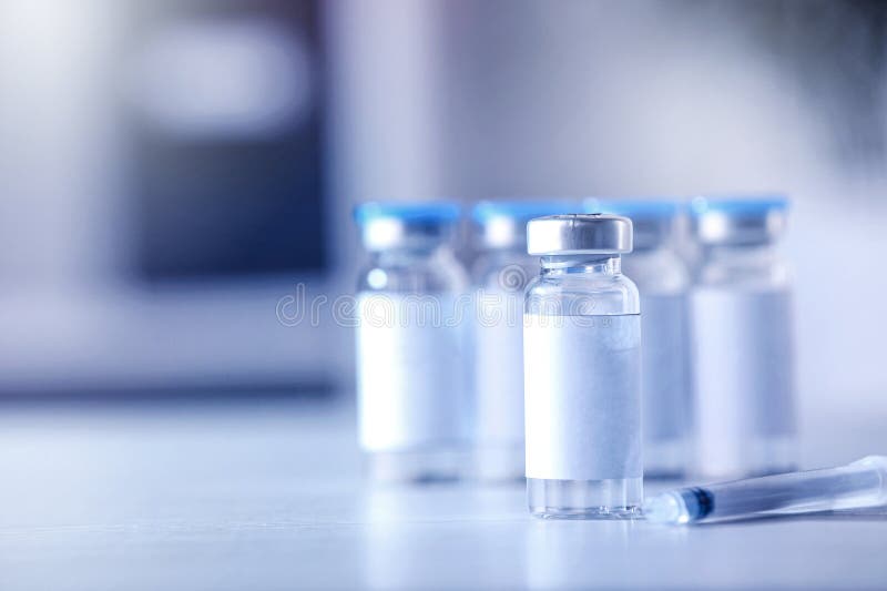 Medication in Vials and Syringe on White Table, Space for Text Stock ...