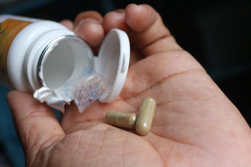 Medicine Capsule on the Hand. Stock Image - Image of holding ...