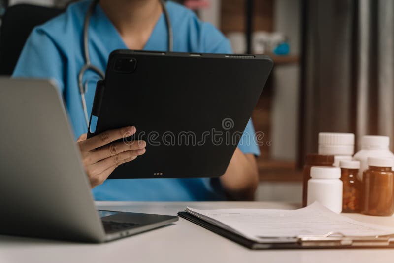 Medicine Doctor Hand Working with Modern Smartphone and Digital Tablet ...
