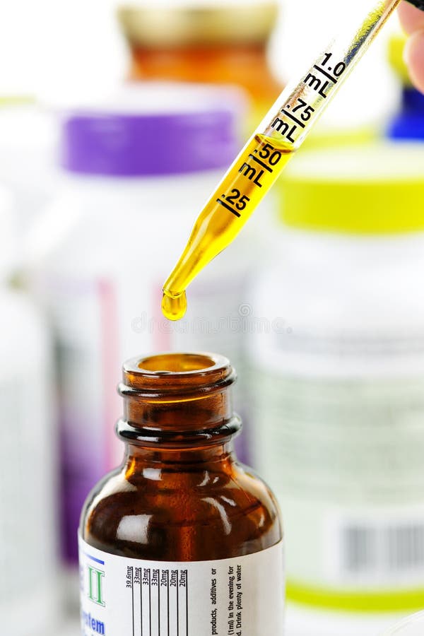 Medicine Dropper and Bottle Stock Photo - Image of extract, dripping ...