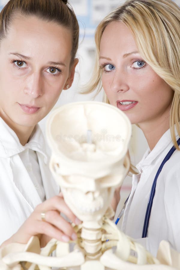 Medicine Students with Skeleton Stock Image - Image of smiling, patient ...