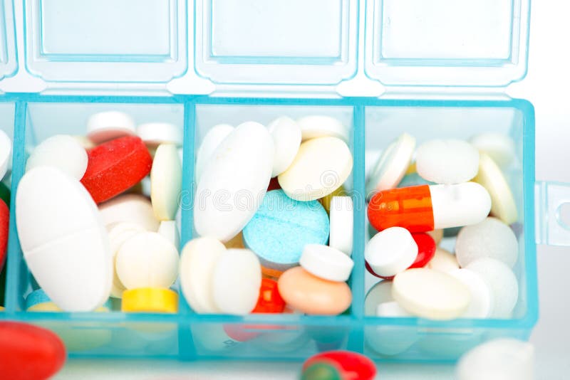 Medicine Tablet and Capsule in Weekly Pill Box Stock Photo - Image of ...