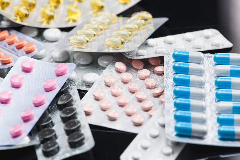 Medicine Tablets on the Table in the Group Stock Photo - Image of ...