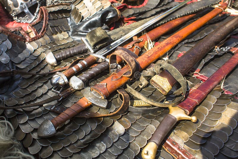 Medieval swords and armor stock image. Image of armory - 35718669