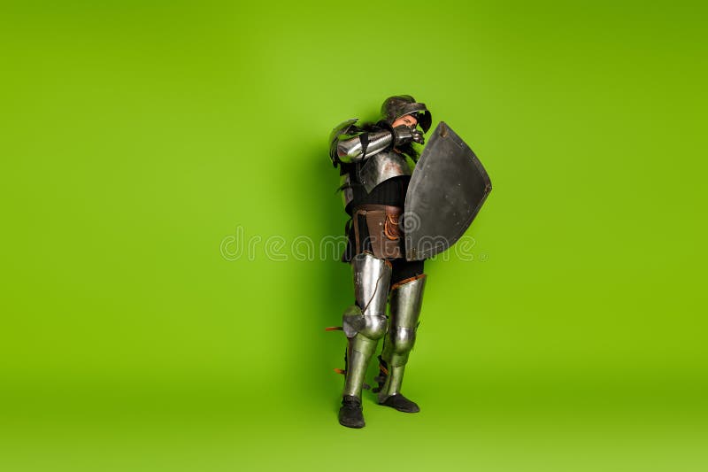 Medieval Knight in Full Armor Holding a Shield, Standing Confidently ...
