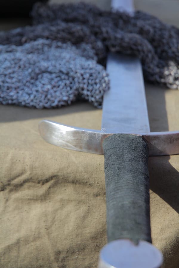 Medieval armour and sword stock photo. Image of pattern - 77238142