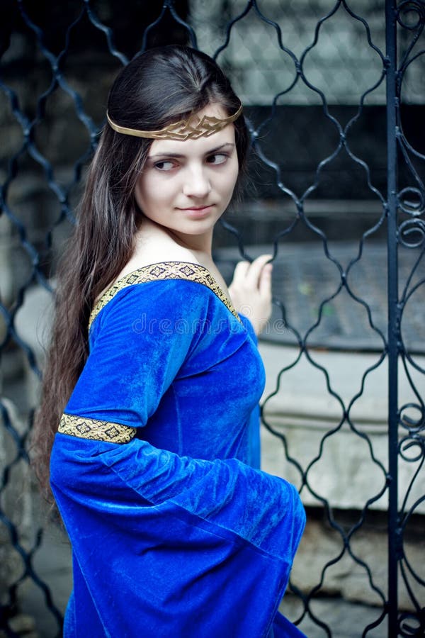 Elf Princess in Roots of Big Tree Stock Photo - Image of crown ...