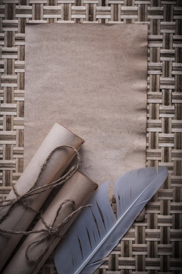 Medieval Blank Sheet Rolled Paper Feather on Wicker Wooden Mat Stock ...