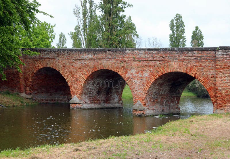 Medieval Bridge Made of Red Bricks with Three Perfect Arches Over a ...
