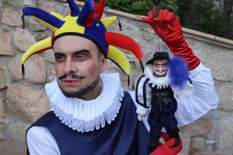 Medieval Buffoon with a Puppet Stock Photo - Image of human, circus ...
