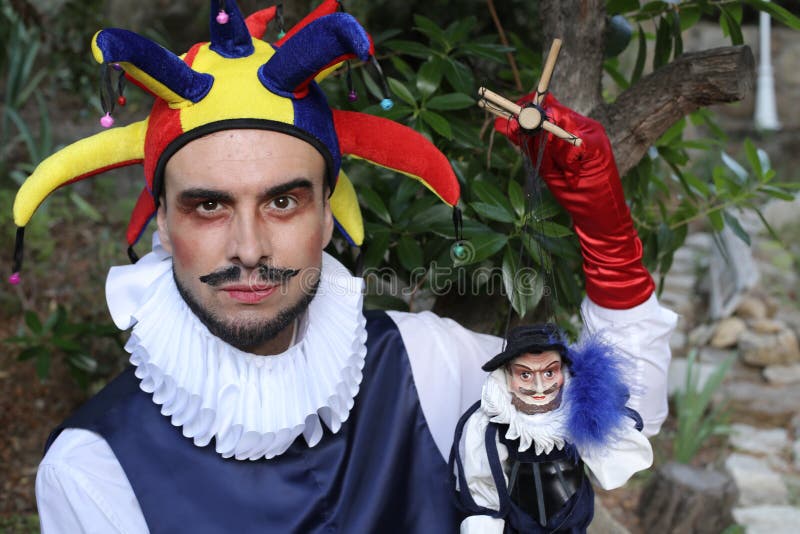 Medieval Buffoon with a Puppet Stock Photo - Image of comedian ...