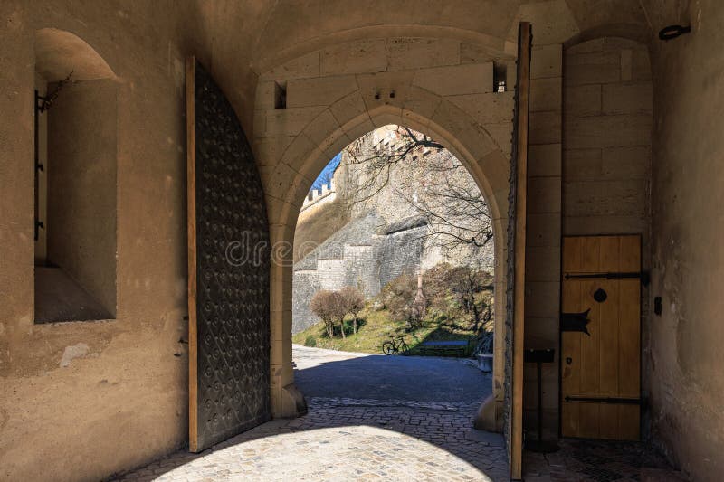 Medieval Castle Archway Leading To Stone Steps and Sunny Garden Path ...