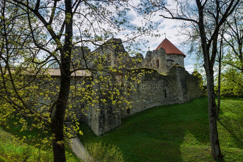 Medieval castle in Cesis stock image. Image of grass - 201678369
