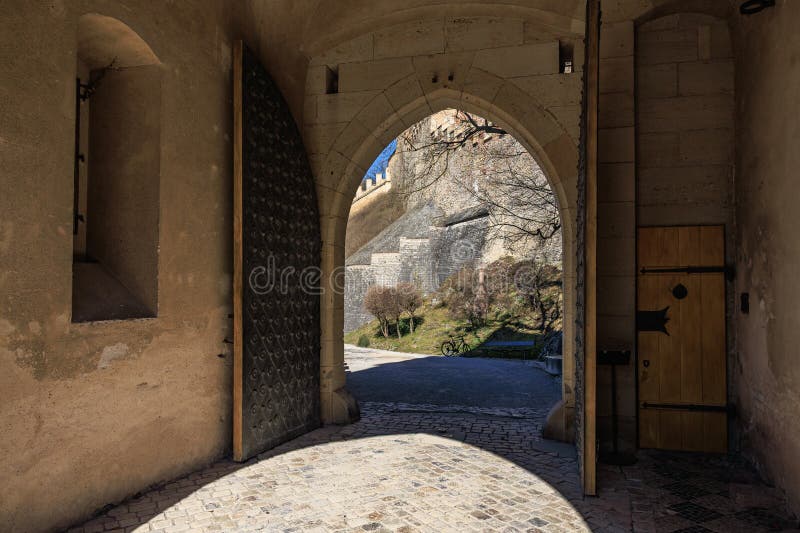 Medieval Castle Entrance with Open Gates and Sunlit Courtyard Stock ...