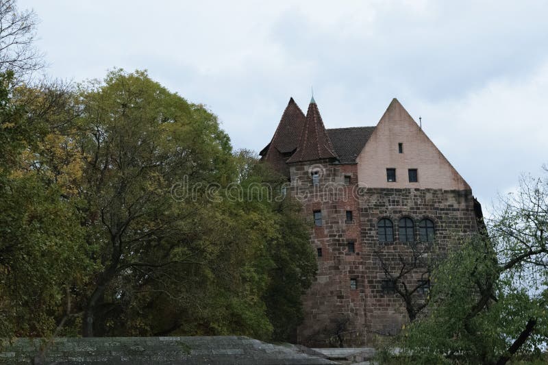 Medieval Castle with Pointed Roofs and Trees Stock Photo - Image of ...