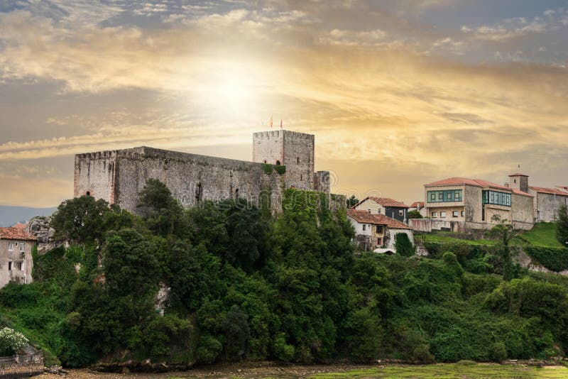 Medieval Castle in Village with Sunset Sky Stock Photo - Image of ...